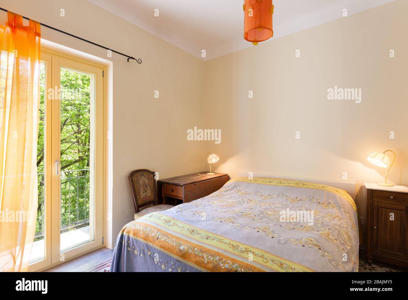 Architecture, small bedroom, double bed view Stock Photo - Alamy