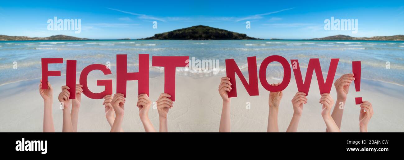 People Hands Holding Word Fight Now, Ocean Background Stock Photo - Alamy