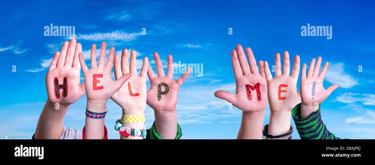 Children Hands Building Word Help Me, Blue Sky Stock Photo - Alamy