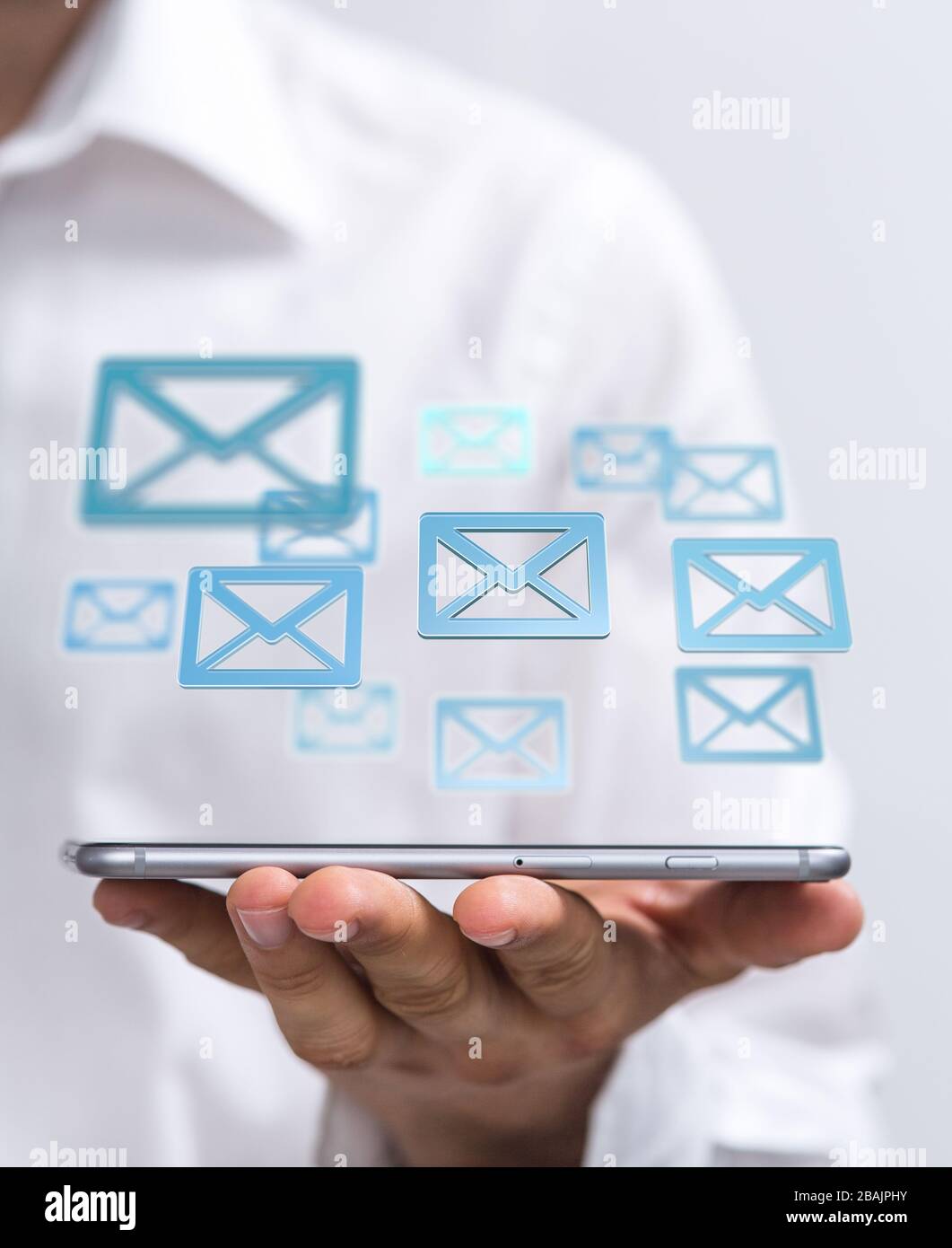 A Hand with an email icon 3d Stock Photo - Alamy