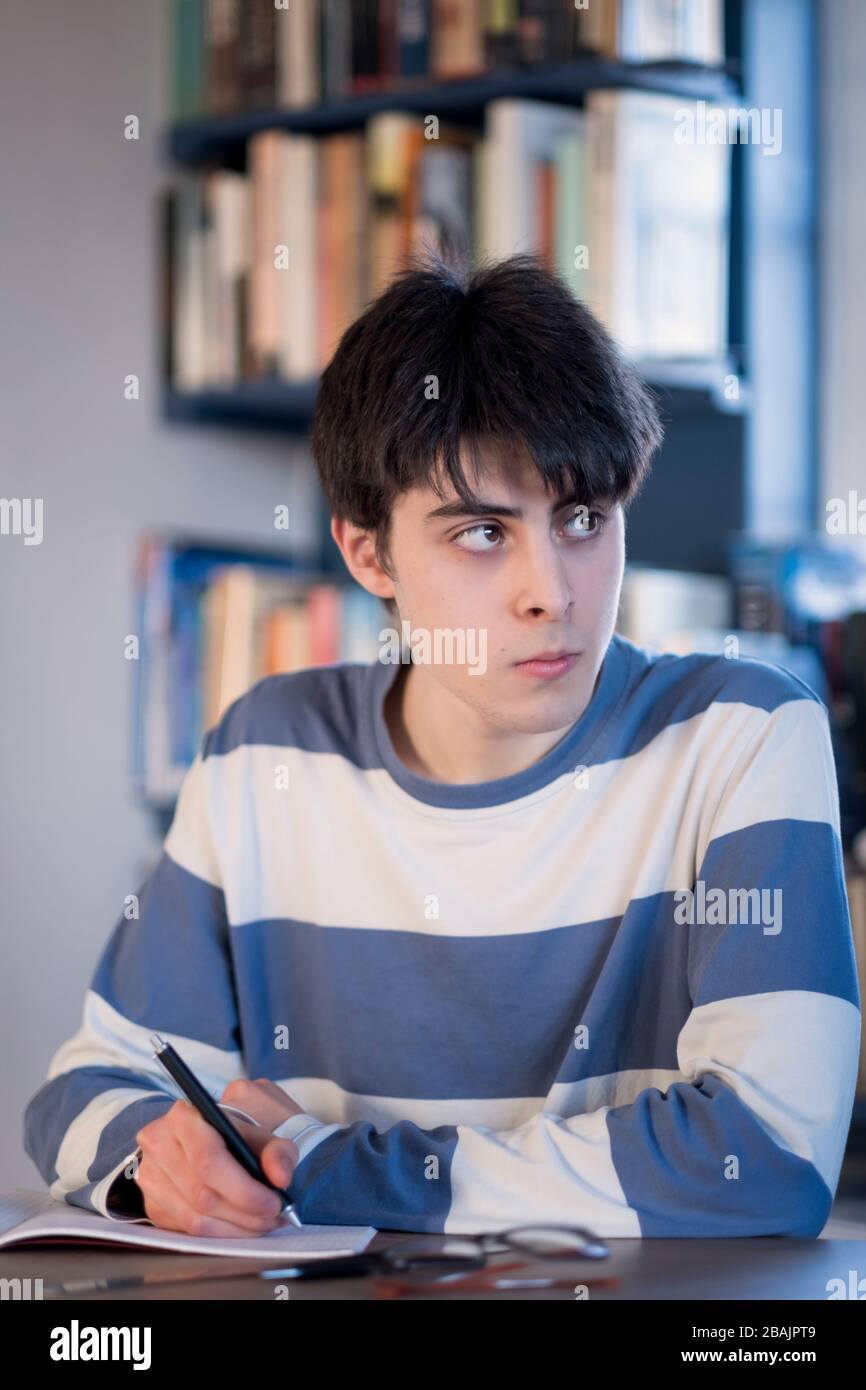 A college student studying at home Stock Photo - Alamy