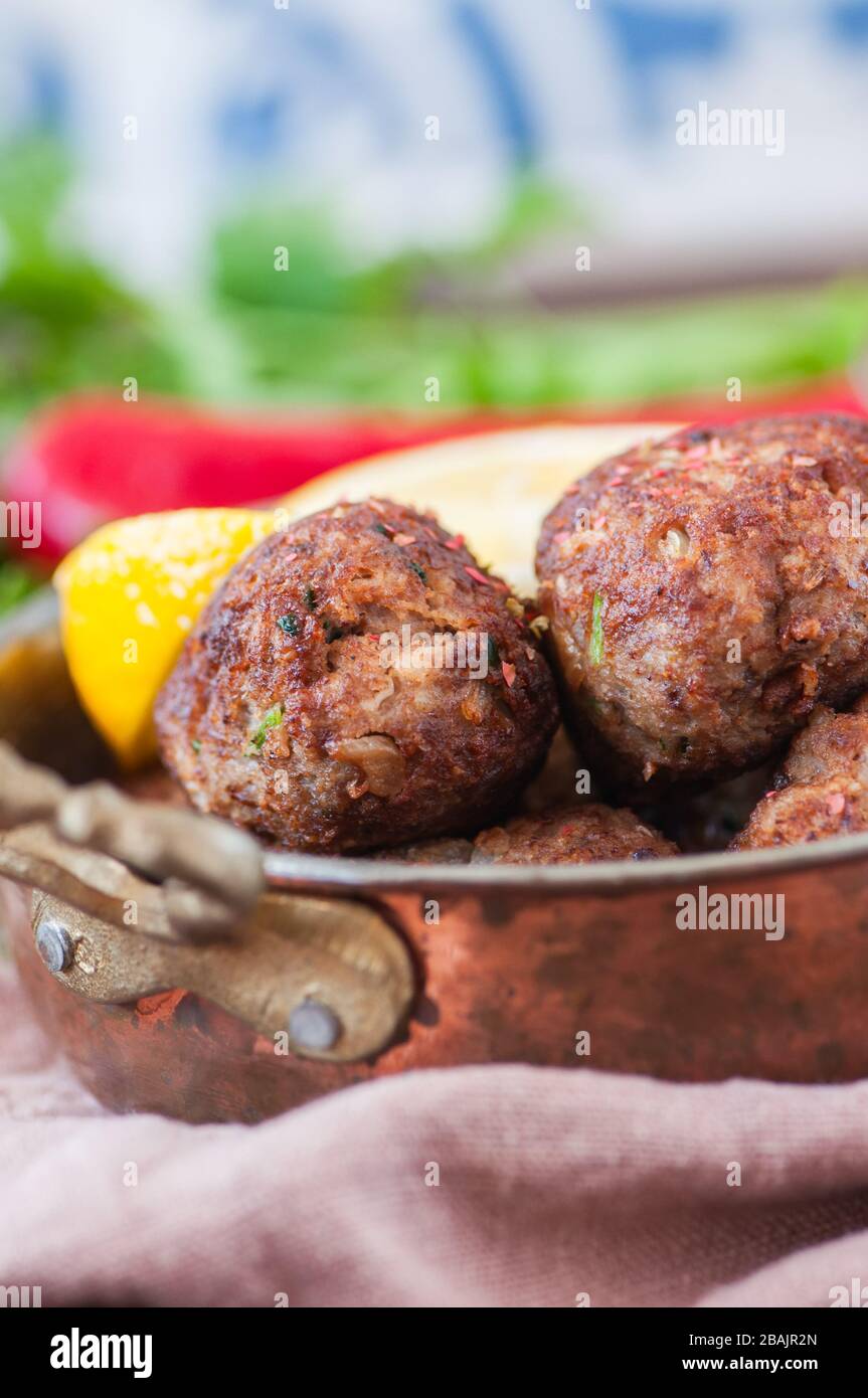 Fried minced meat kofta or kebab in a bowl. Close up. Middle eastern ...