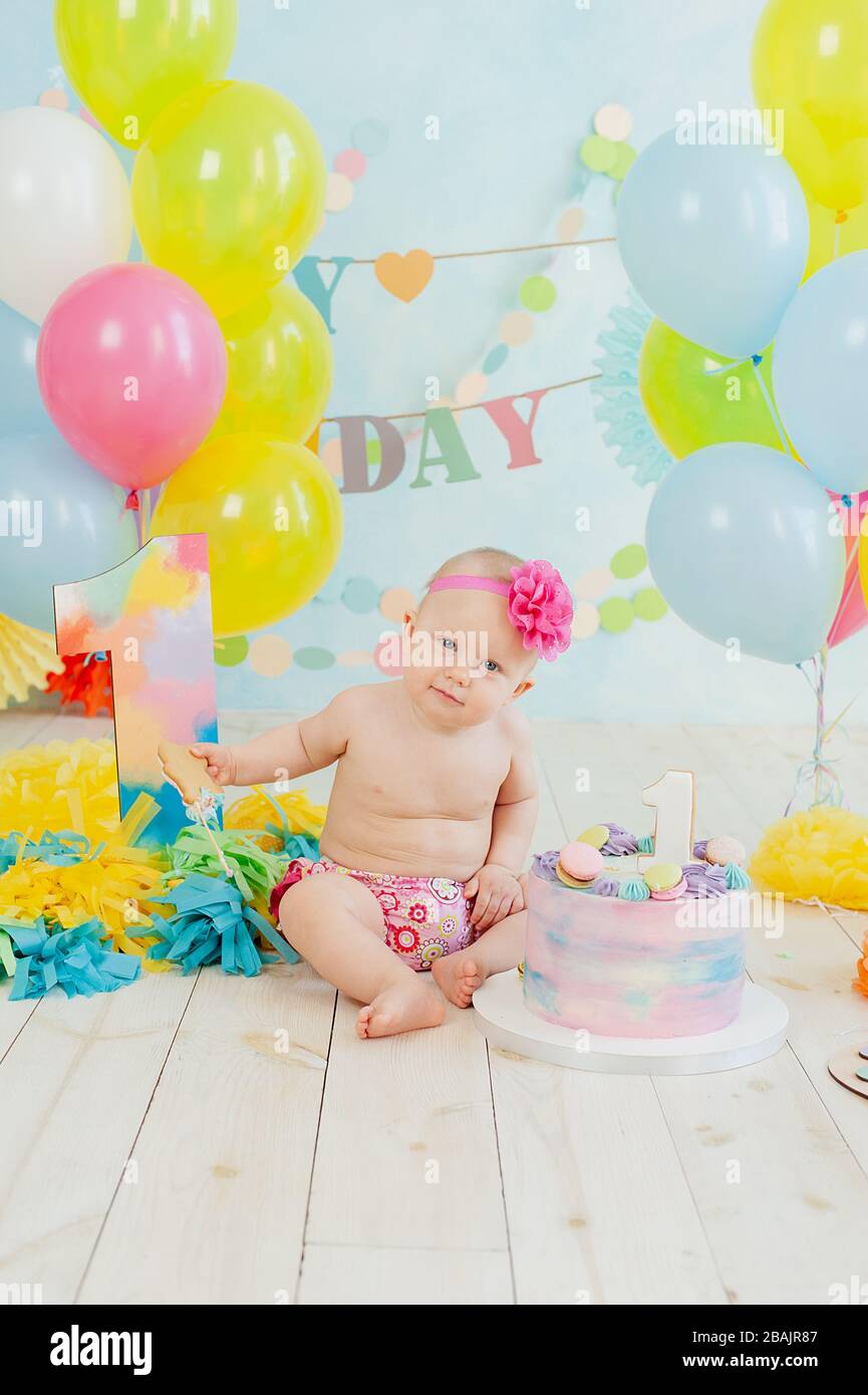 First birthday smash the cake. cream on legs. Festive background ...