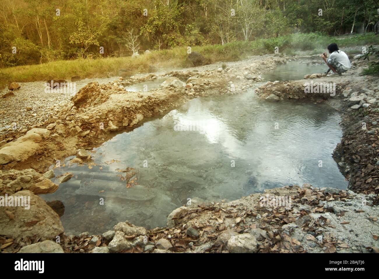 Thai people happiness cooking boiling eggs in hot spring of Ta Pai Hot ...