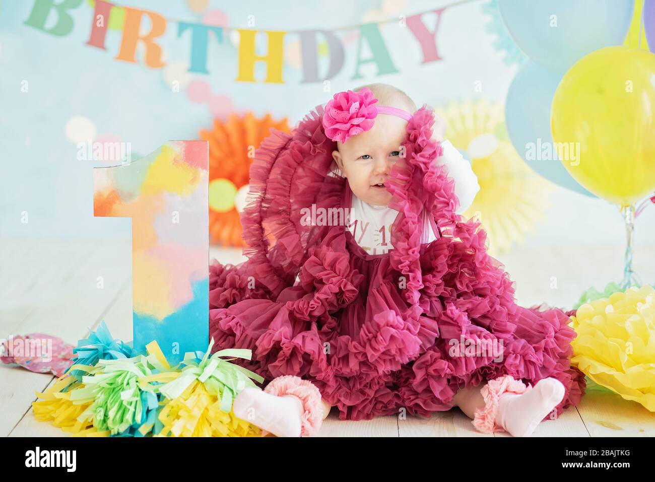 First birthday smash the cake. cream on legs. Festive background ...