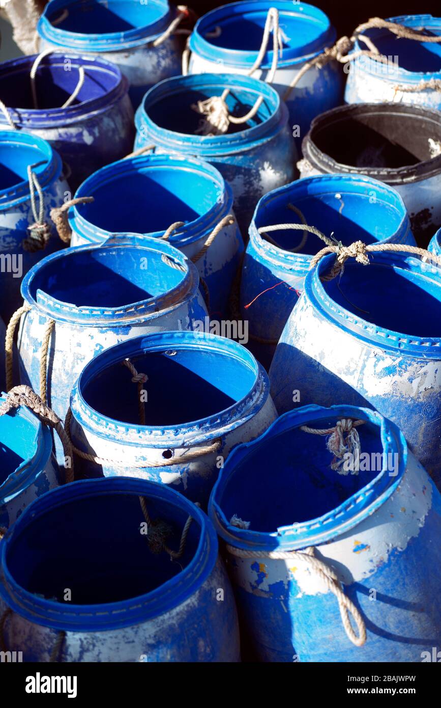 Large plastic Fish bucket Crates on a fishing boat Stock Photo - Alamy