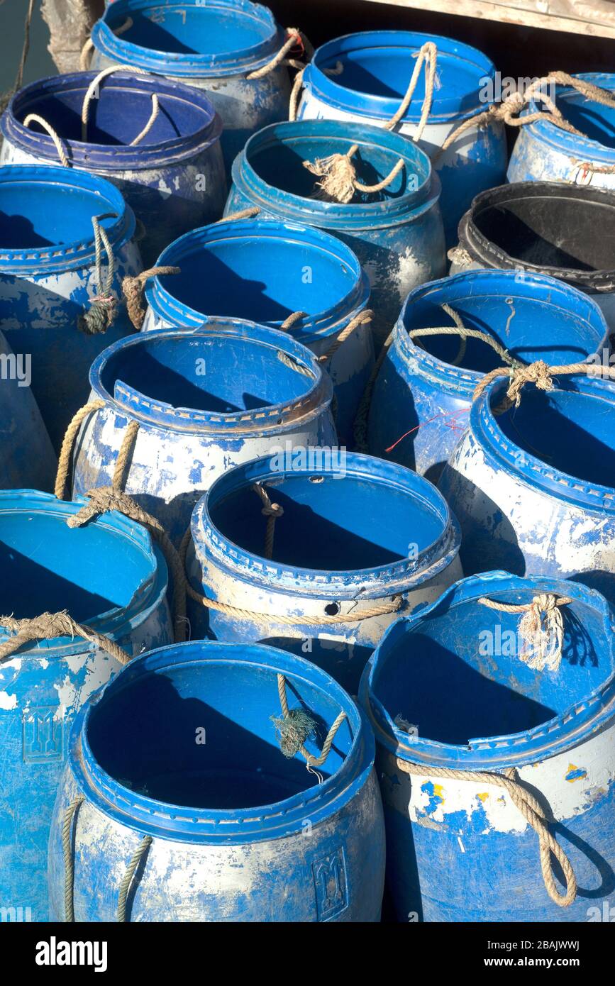 Large plastic Fish bucket Crates on a fishing boat Stock Photo - Alamy
