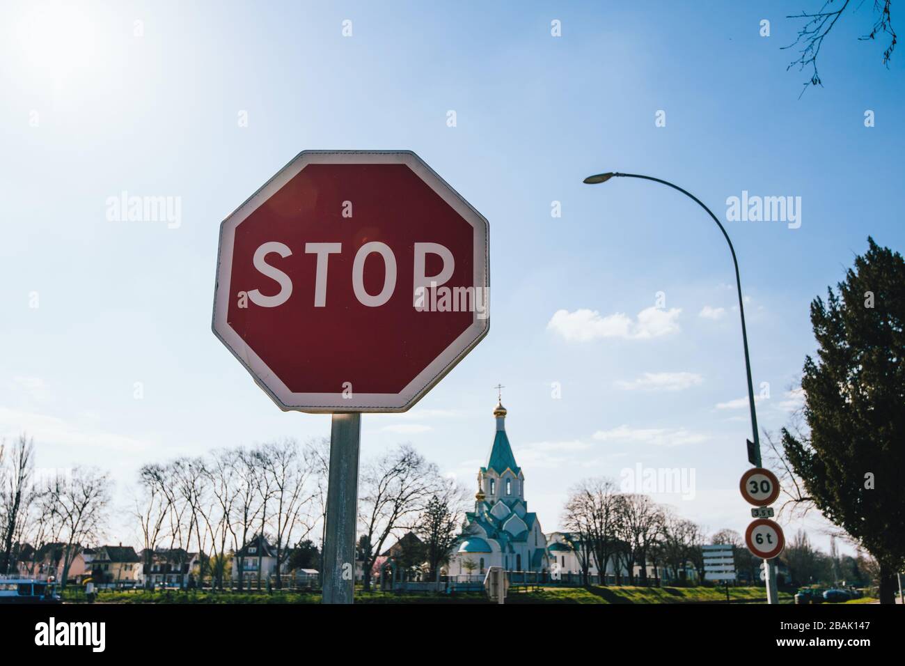 Stop street sign and Strasbourg Russian Orthodox Church silhouette ...