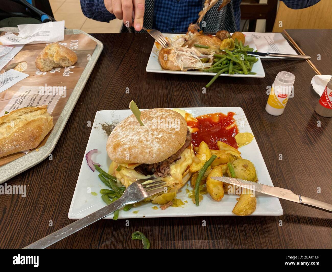 Paris, France - FEB 11, 2020: POV people eating delicious food in the ...