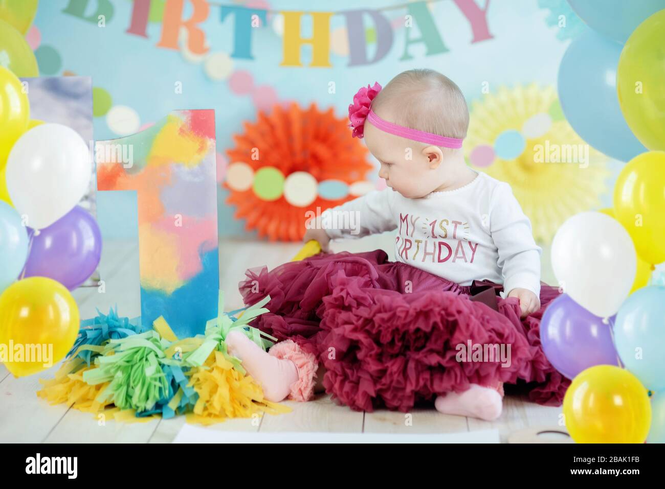First birthday smash the cake. cream on legs. Festive background ...