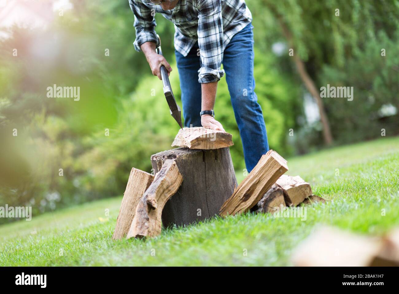 firewood in the garden Stock Photo - Alamy
