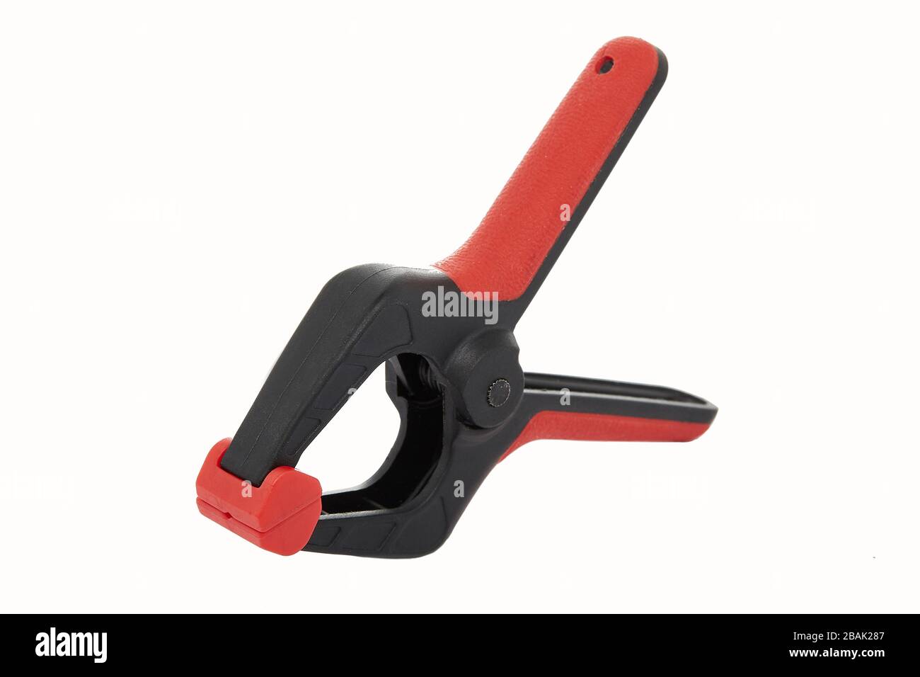 Red and black clam. Work tools Stock Photo - Alamy