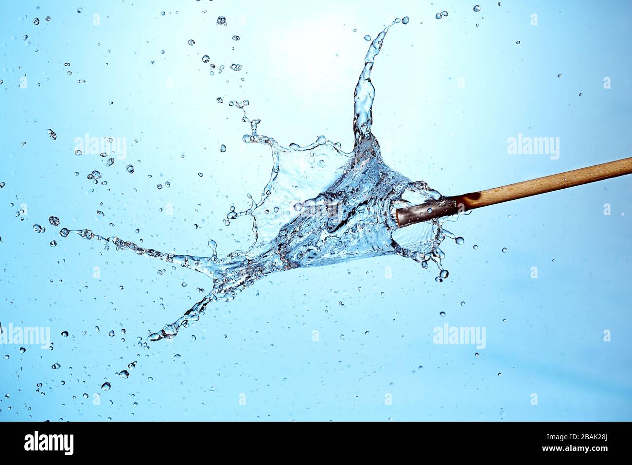 Wand in the blue water Stock Photo - Alamy