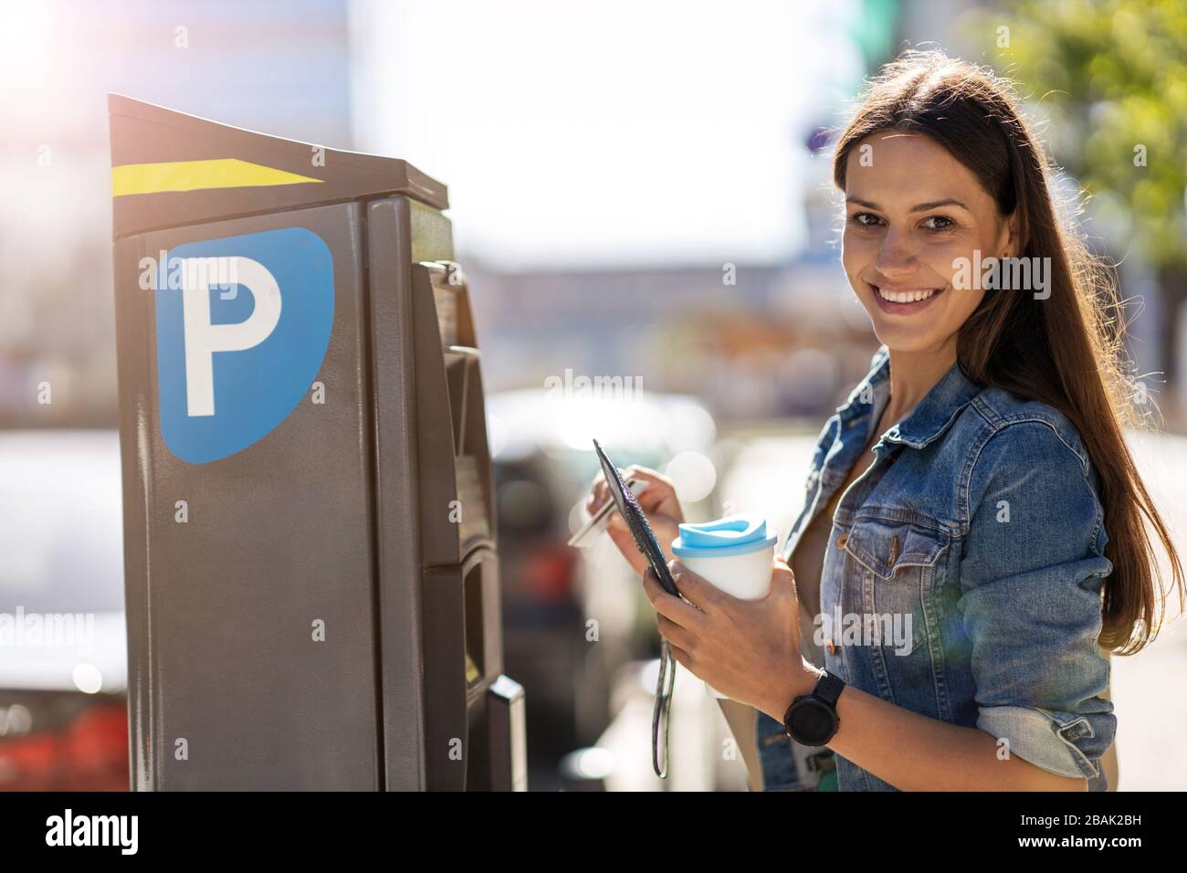 Woman parking meter hi-res stock photography and images - Alamy