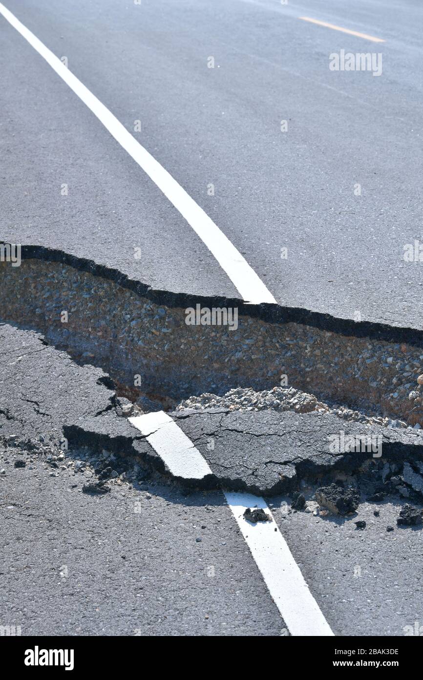 Asphalt road collapses, down and fallen after flood Stock Photo - Alamy