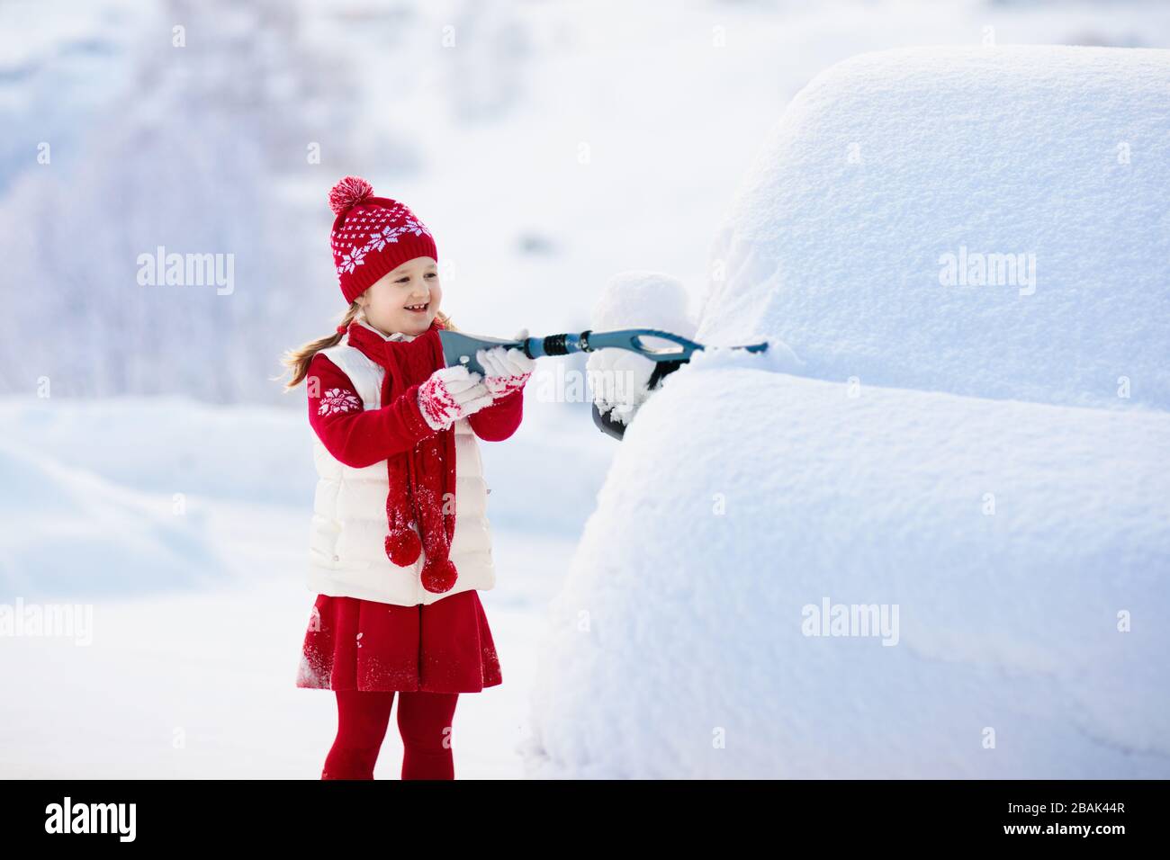 Children shoveling snow hi-res stock photography and images - Alamy
