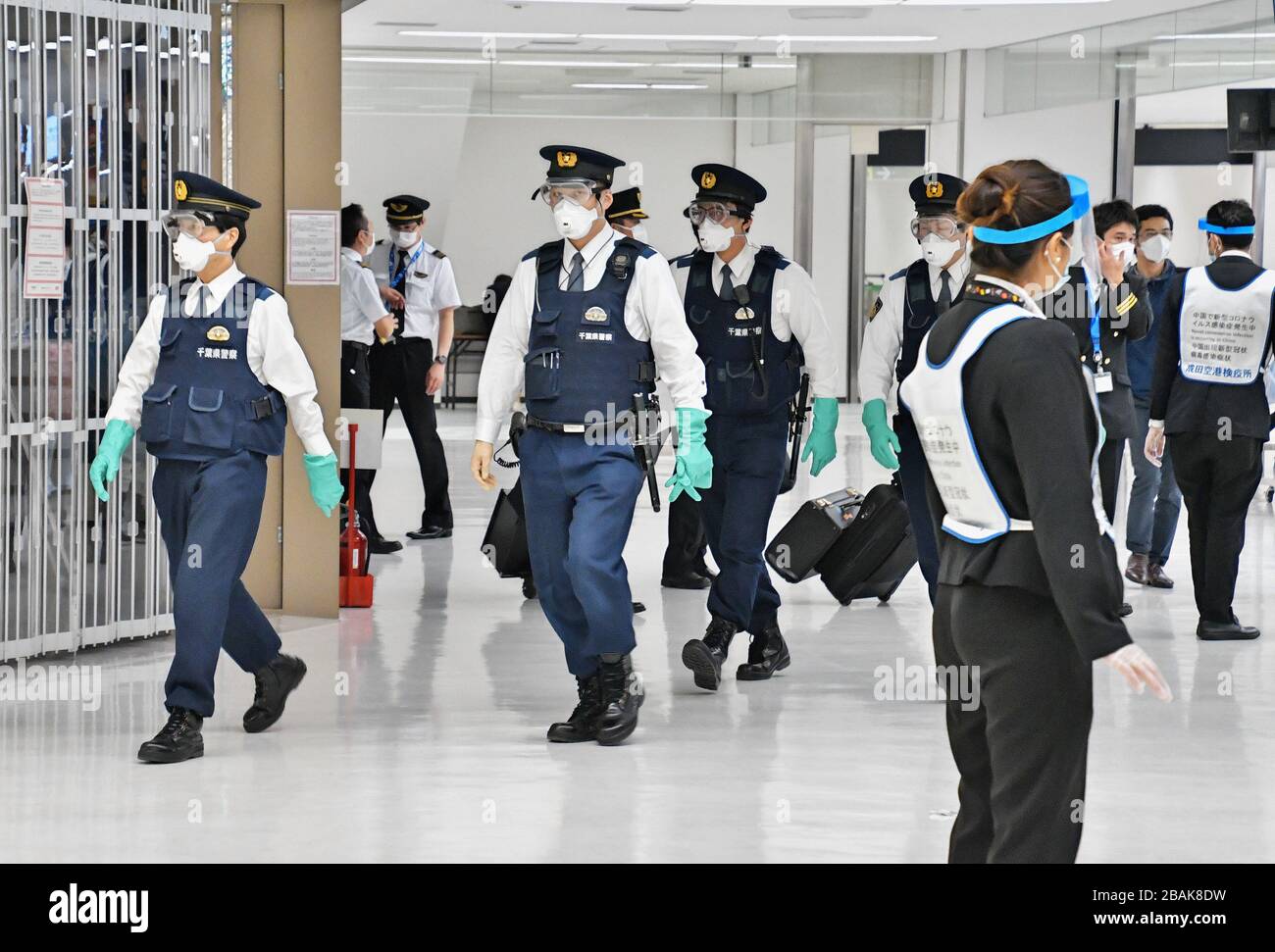 Narita, Japan. 28th Mar, 2020. Police officer of Chiba-prefecture stand ...