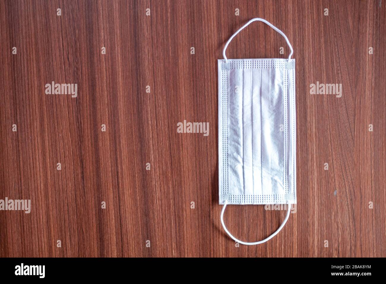 Surgical Paper Mask. Disposable Paper Mask Placed On The Table Stock ...