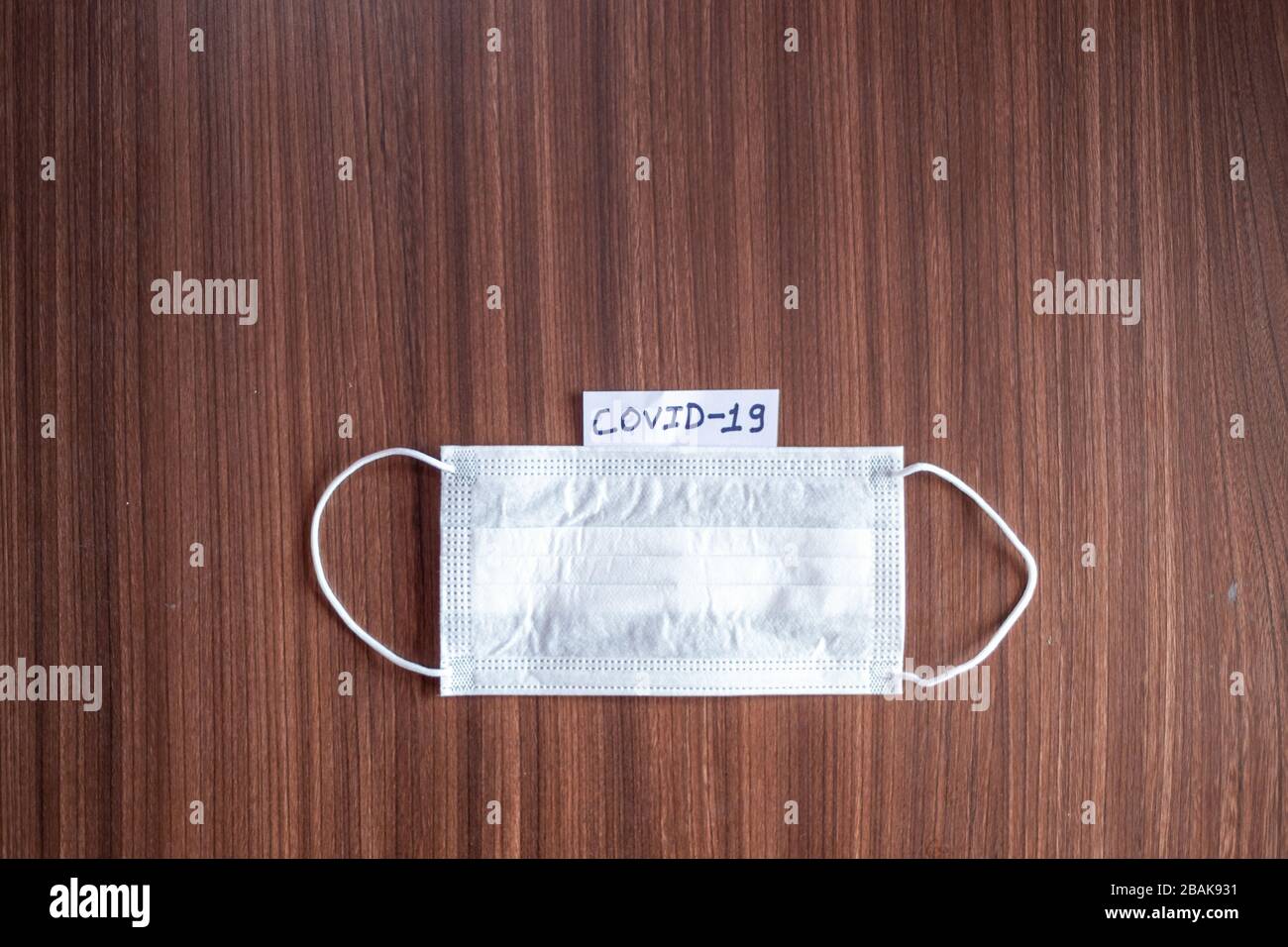 Surgical Paper Mask. Disposable Paper Mask Placed On The Table With ...