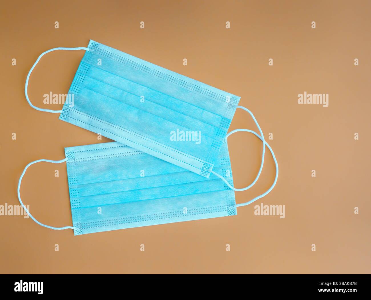 Surgical mask with rubber ear straps. Typical 3-ply surgical mask to ...