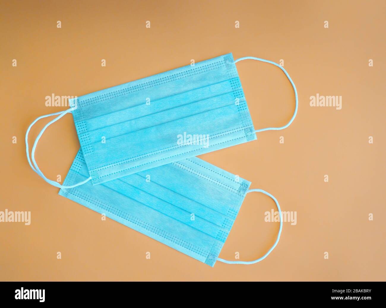 Surgical mask with rubber ear straps. Typical 3-ply surgical mask to ...