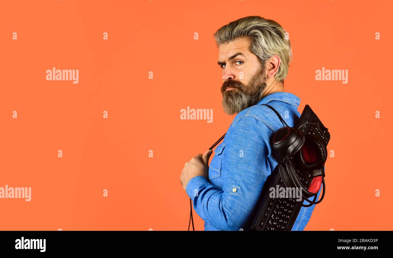 Hipster gamer headphones and keyboard. Gaming addiction. Superior ...