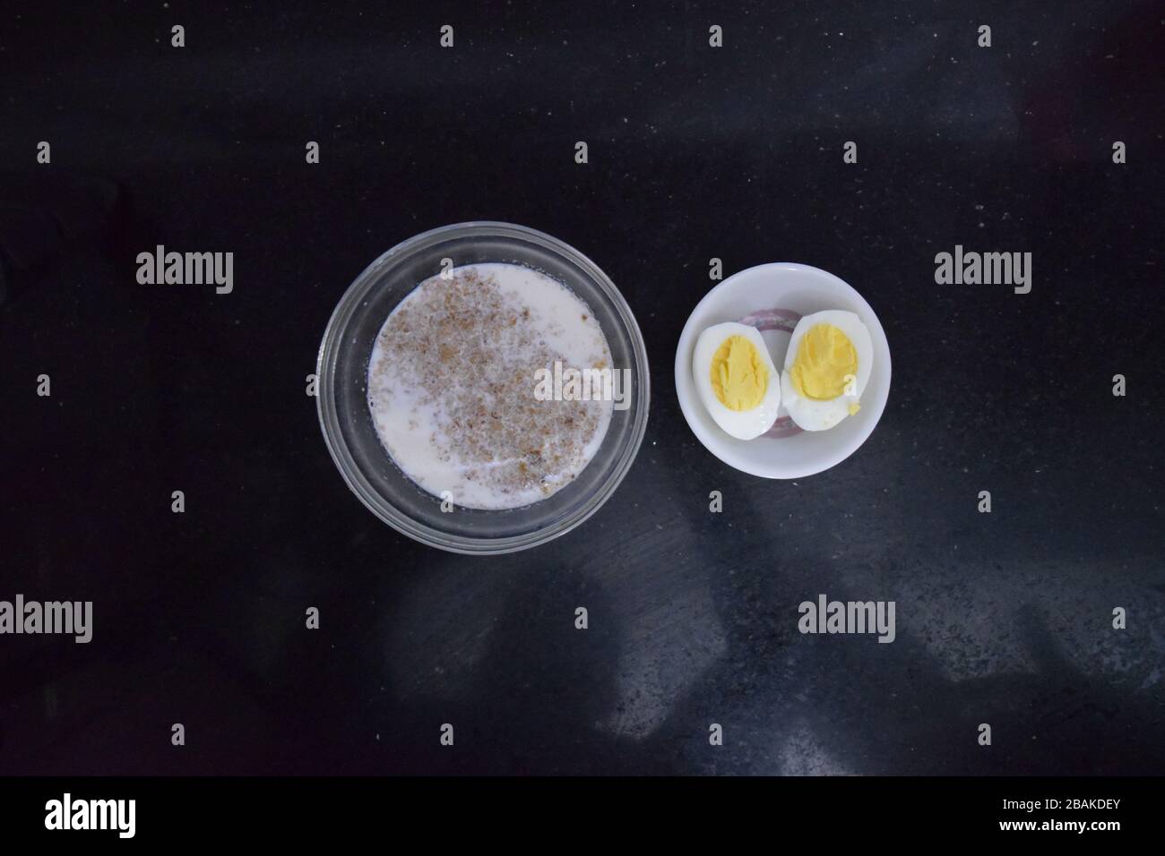 Full boil egg divided into half Stock Photo - Alamy