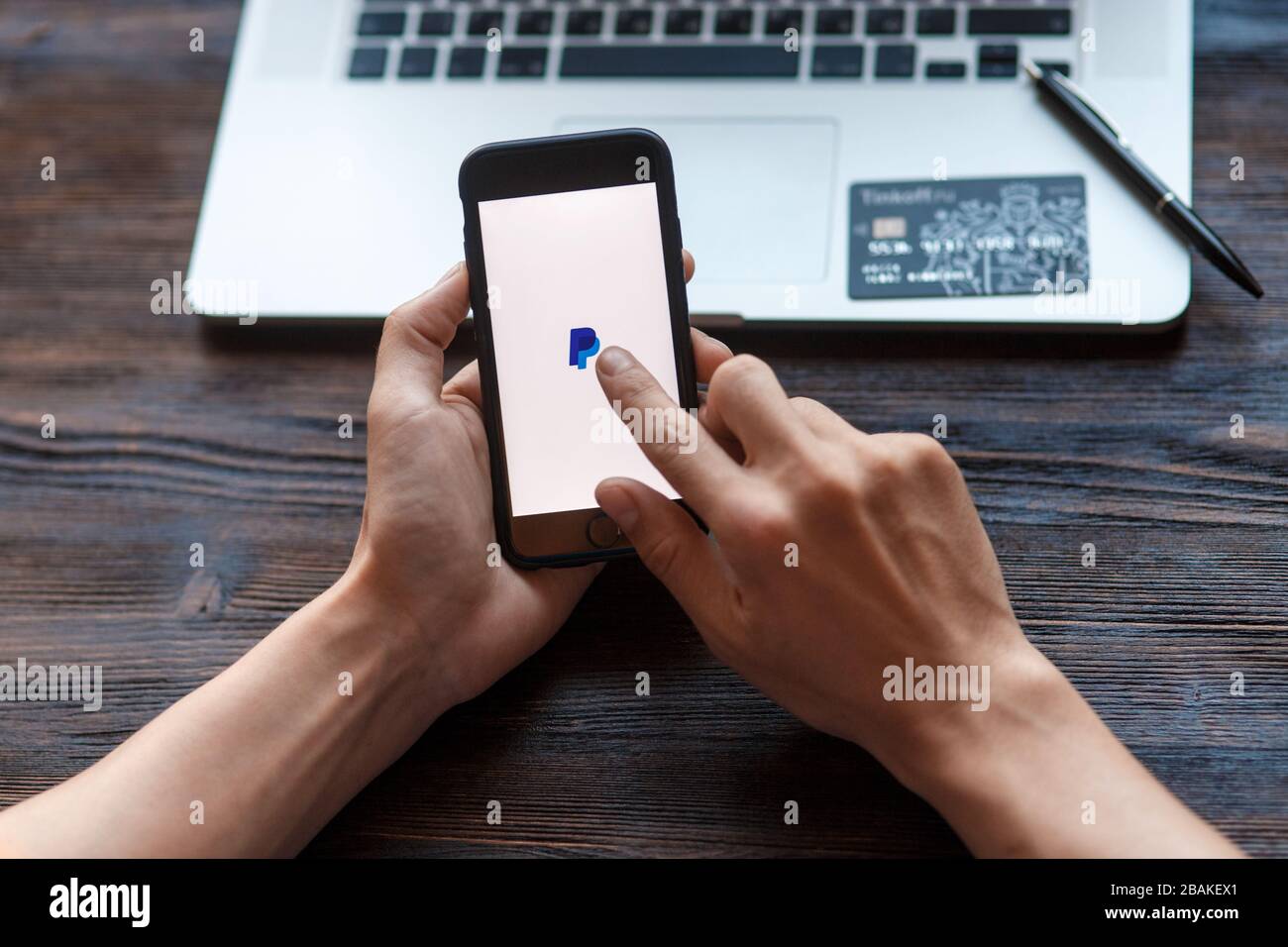 Paypal logo on smartphone screen. Paypal is an American online payment ...