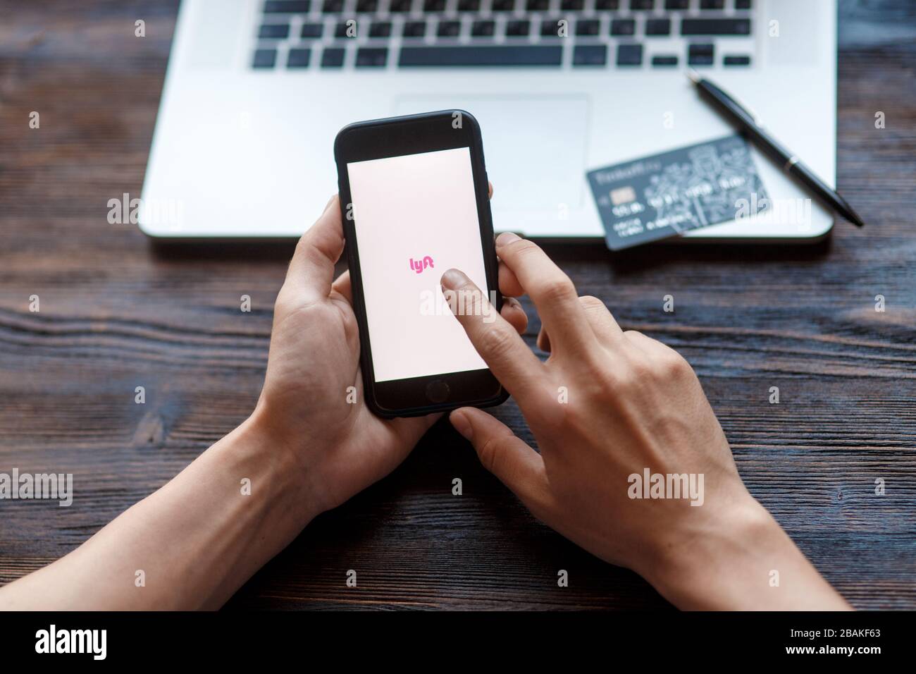 An apple iPhone showing the snapchat application alongside other ...