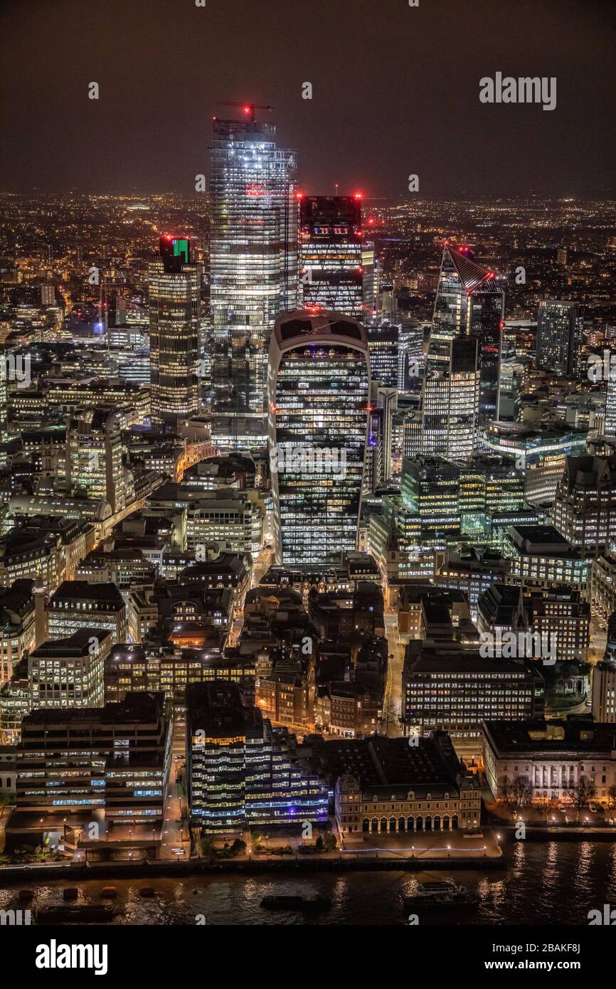 London City and illuminating office buildings taken after dark showing ...