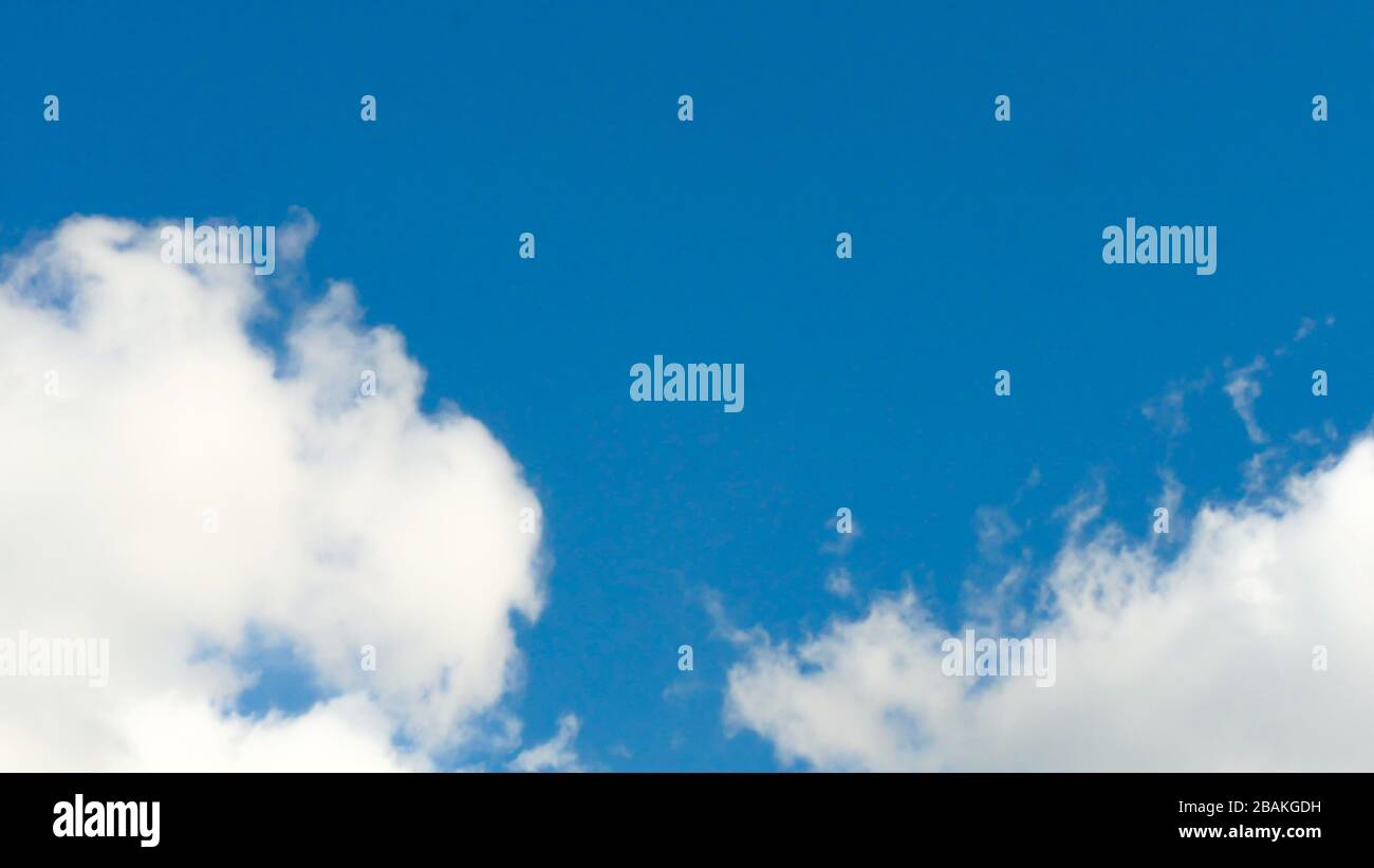 Blue sky background with white clouds. Nature Stock Photo - Alamy