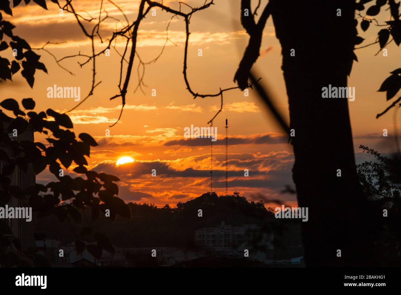 Beautiful sunset under the setting sun Stock Photo - Alamy