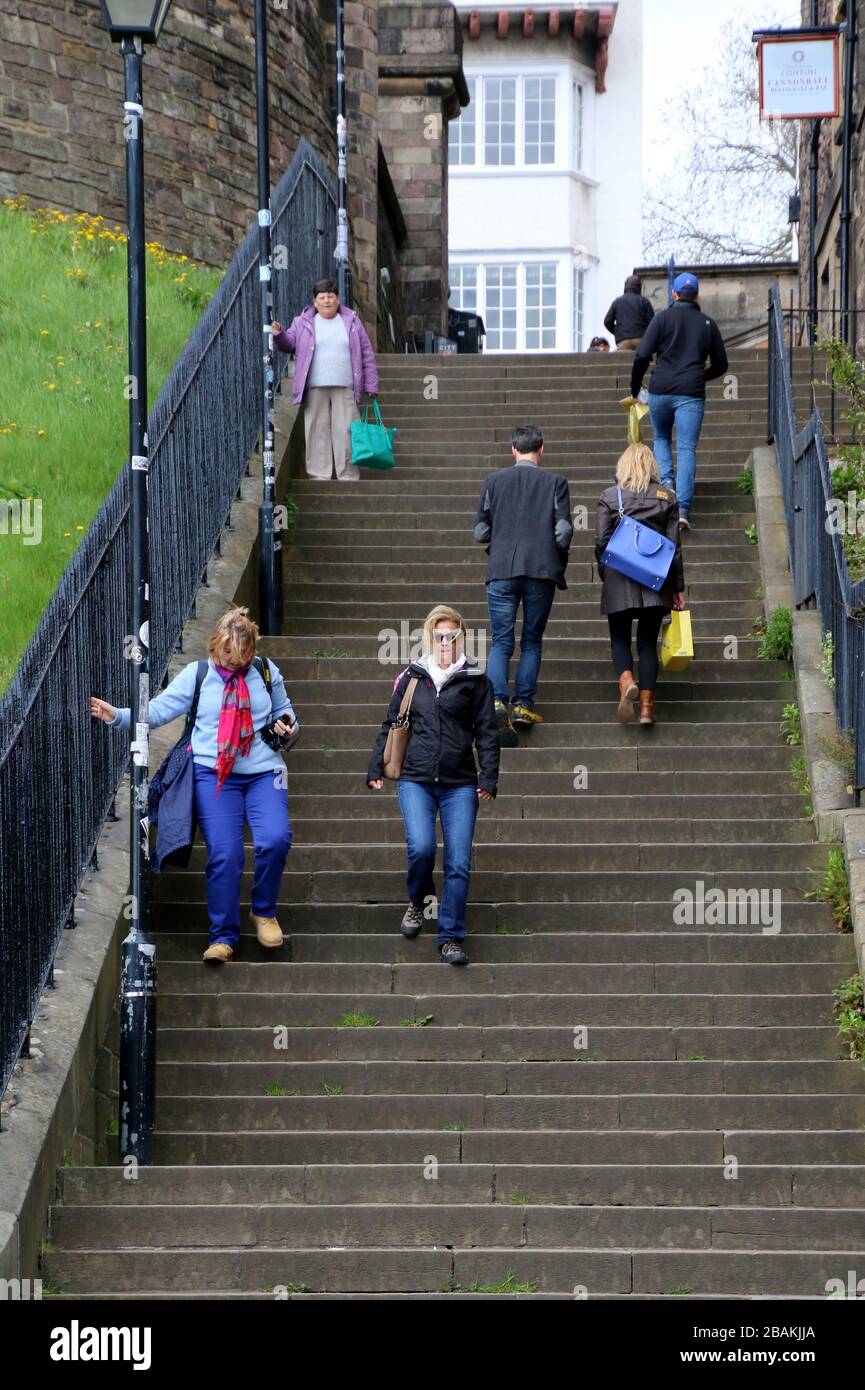 people are walking up and down the steep stairs Stock Photo - Alamy