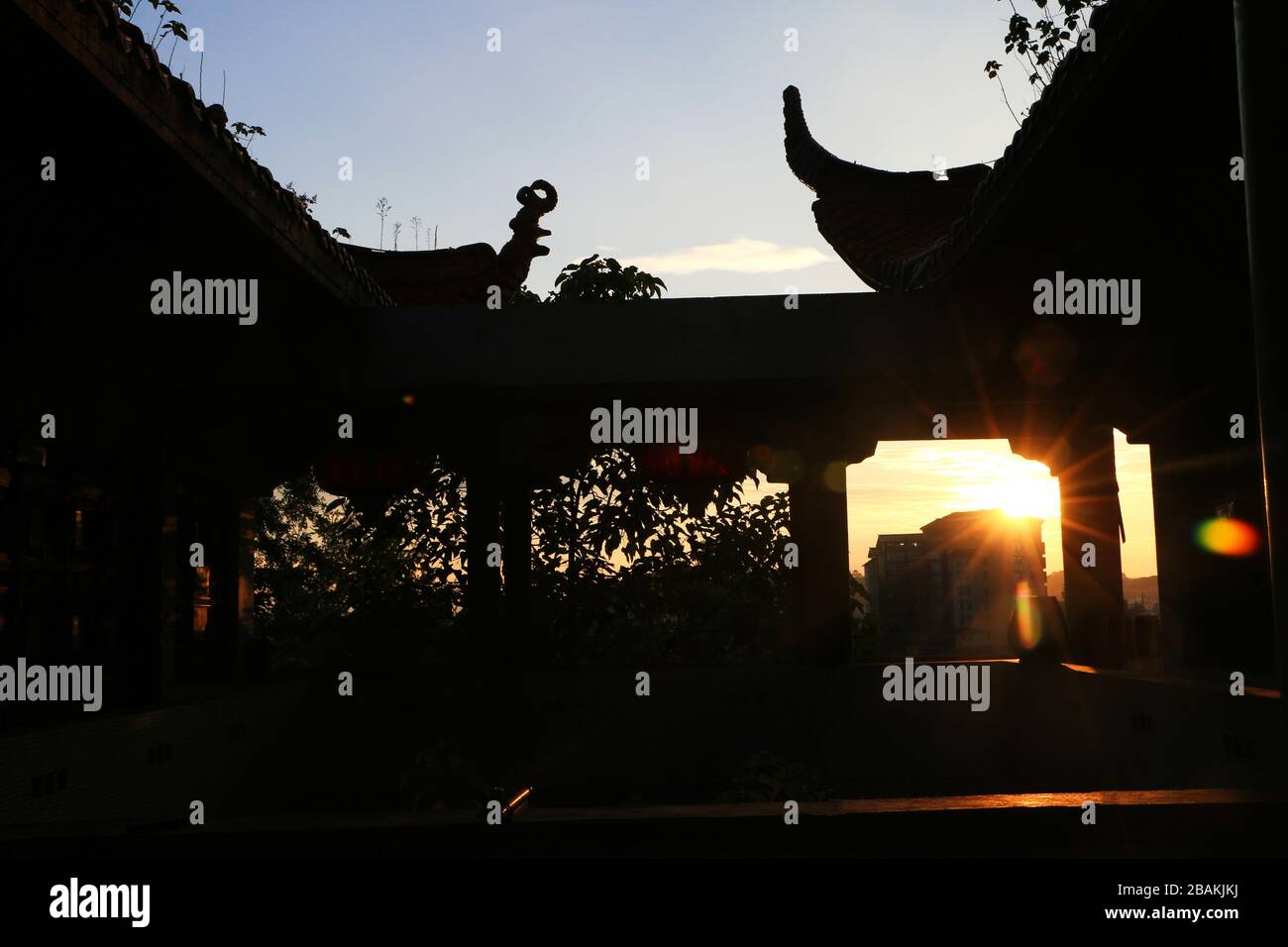 the temple building under the backlight Stock Photo - Alamy