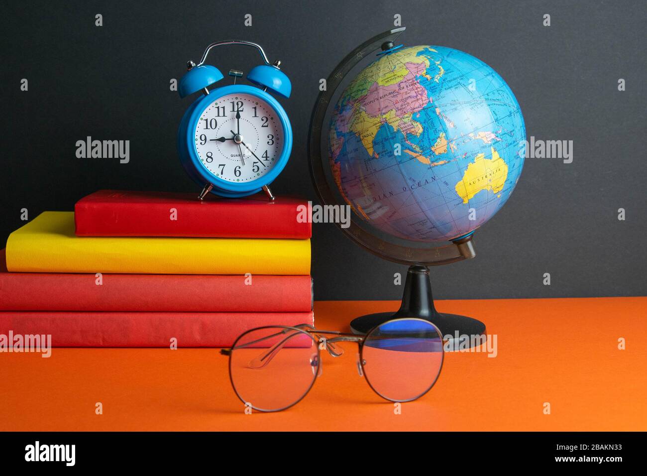Globe Clock On Books High Resolution Stock Photography and Images - Alamy