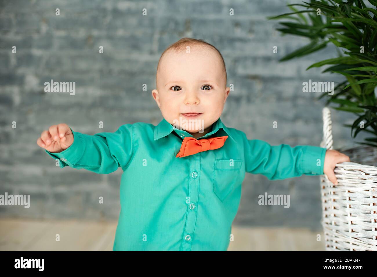 cute 1 year old boy stands. Child with happy expression. sweet baby boy ...