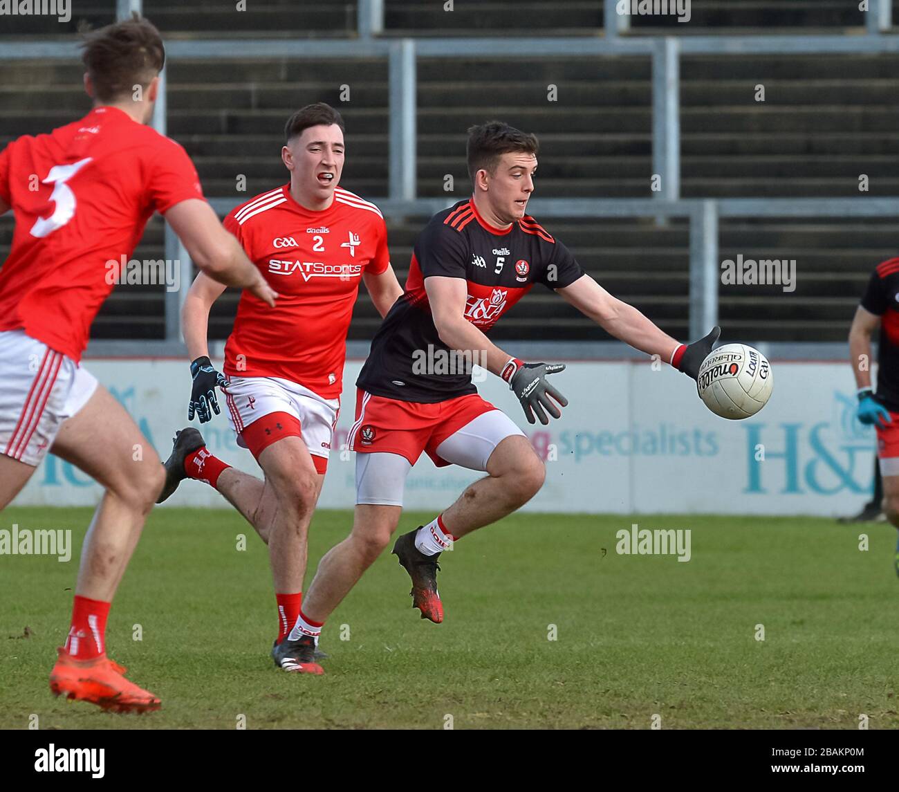 Action from GAA football game between Derry and Louth in Celtic Park ...