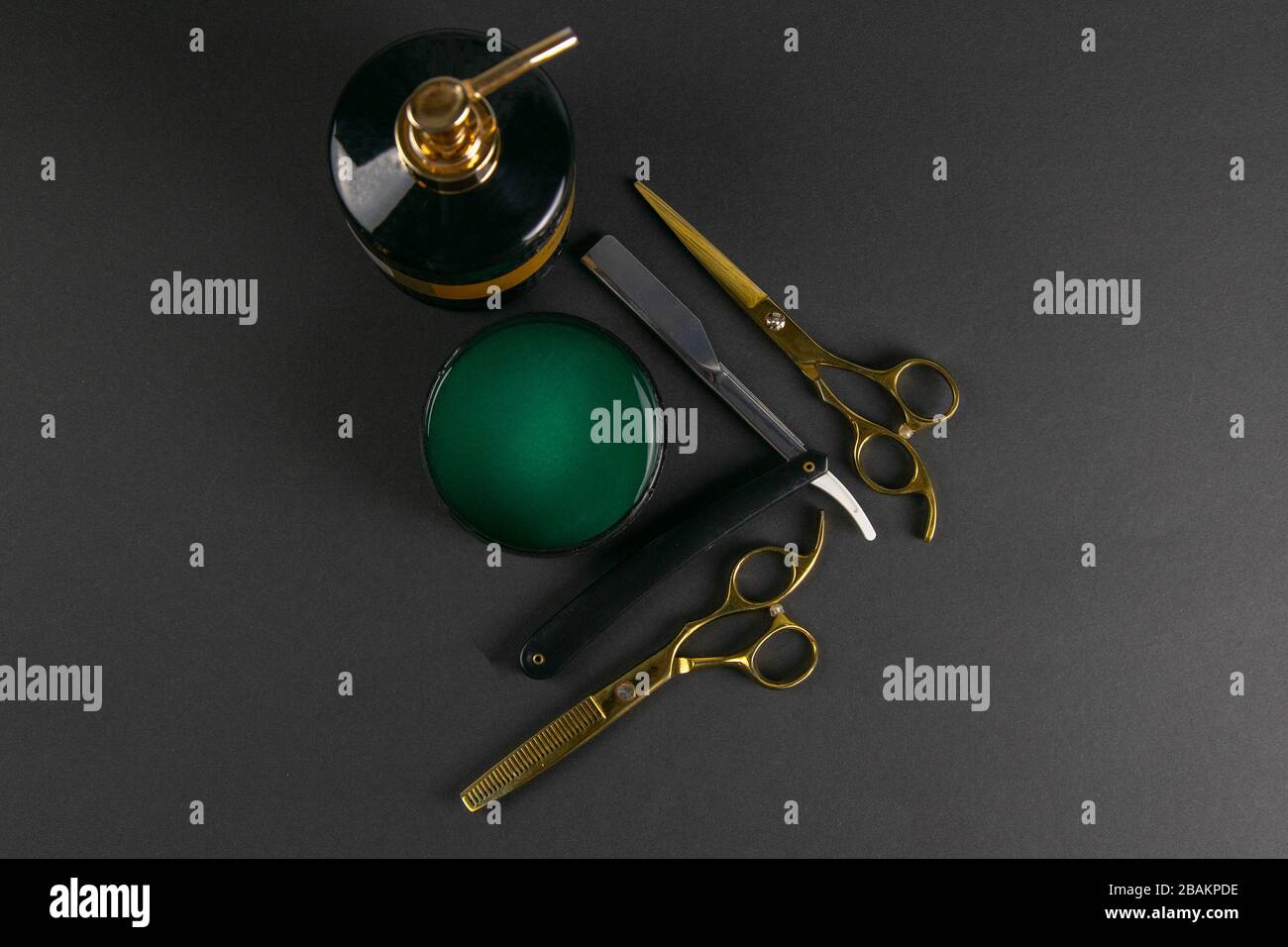 Dangerous razor, shaving gel, haircut and comb scissors stand on the ...