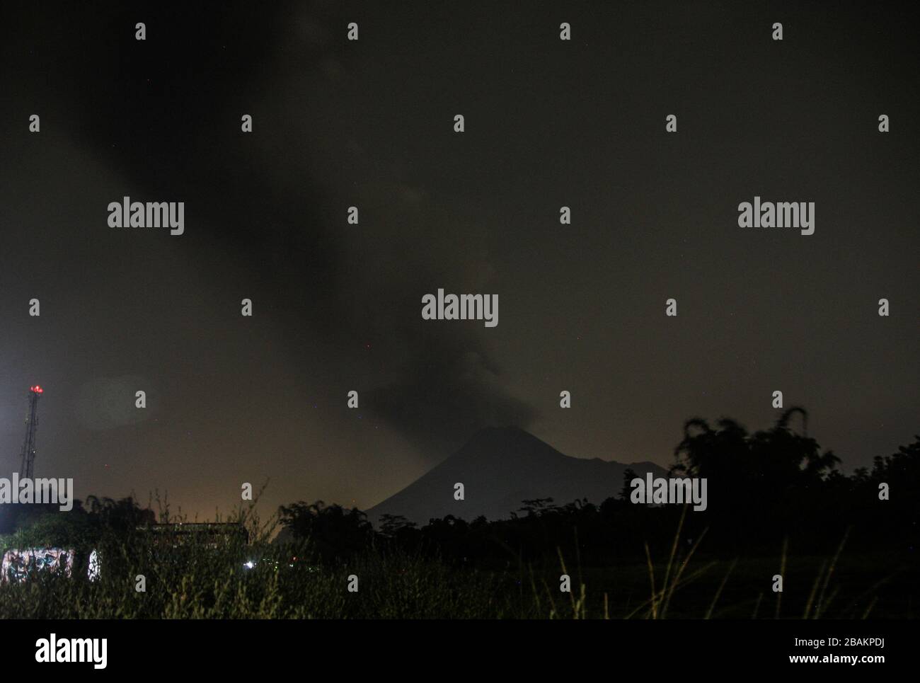 Sleman, Indonesia. 28th Mar, 2020. Mount Merapi erupted with a column ...