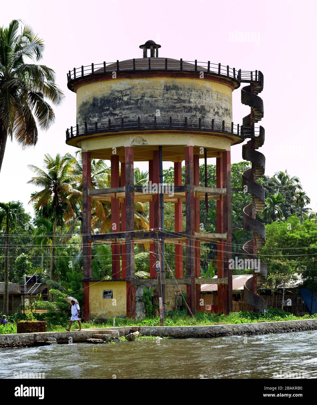 Cochin, India - 15th November 2019:Walking past the large water tower ...