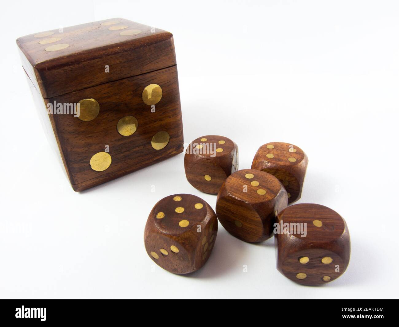 brown dice on white Stock Photo - Alamy