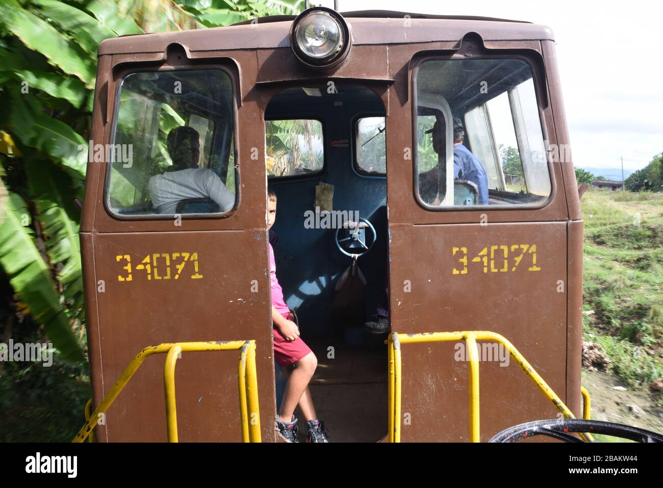 People, men, boy, train, 2014, Cuba Stock Photo - Alamy