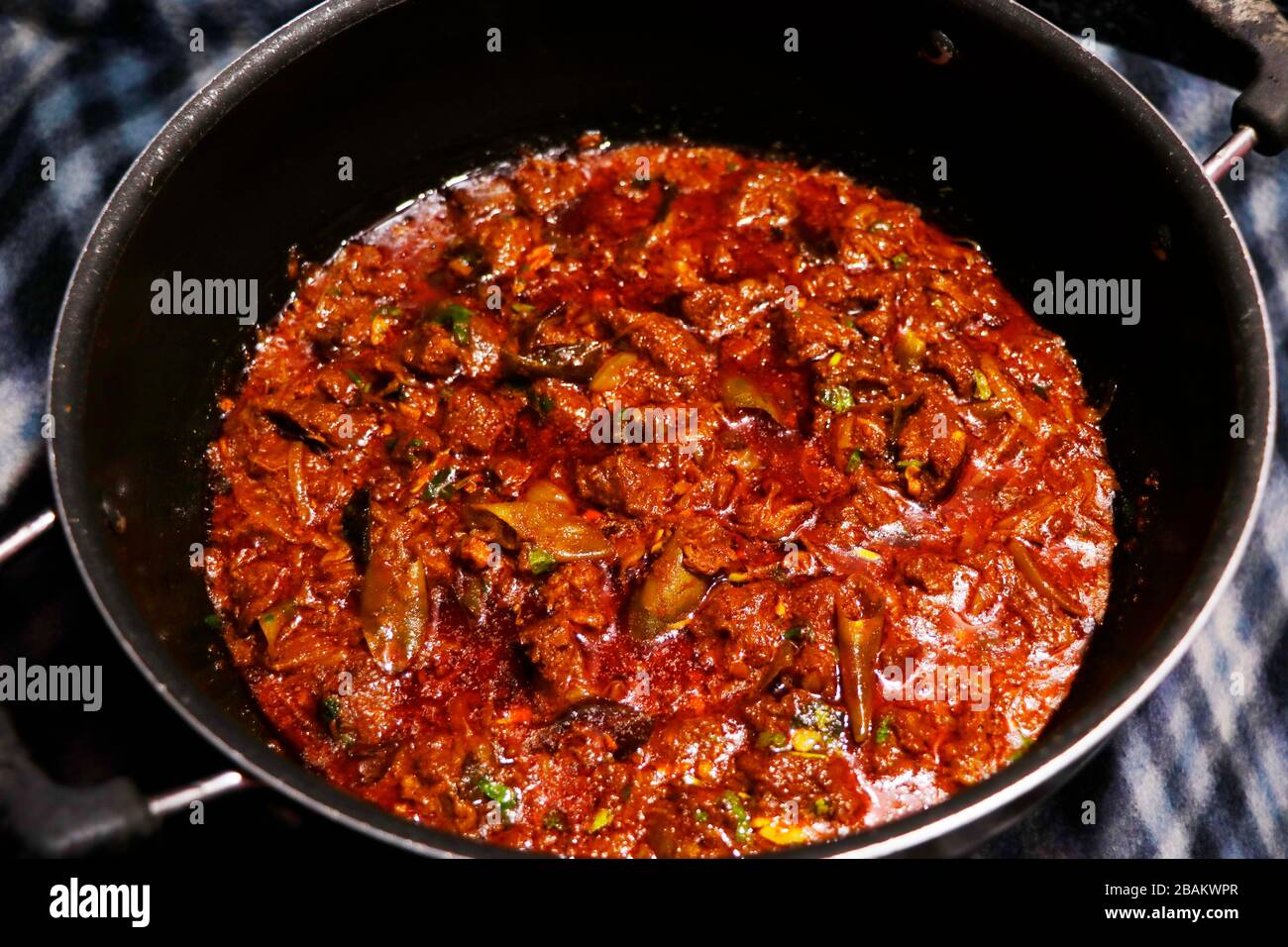Kerala style spicy and hot beef curry in a cooking pot Stock Photo - Alamy