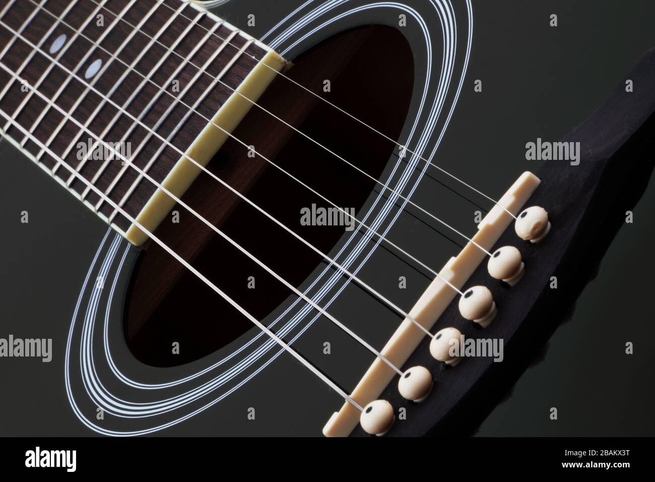 Guitar sound hole bridge and neck with selective focus Stock Photo - Alamy