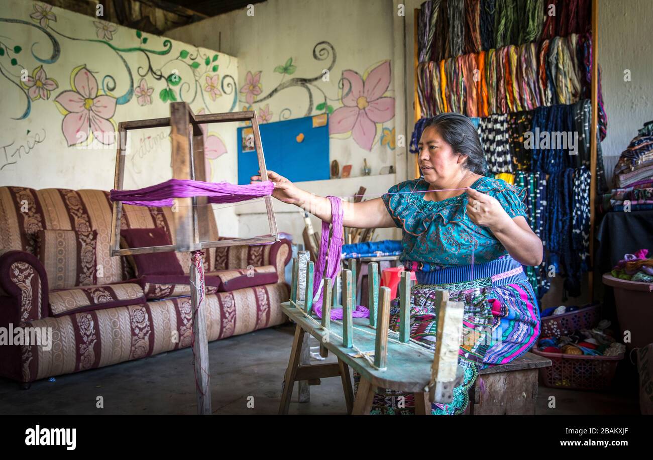 Lake Atitaln, Guatemala, 26th february 2020: mayan woman weaving ...