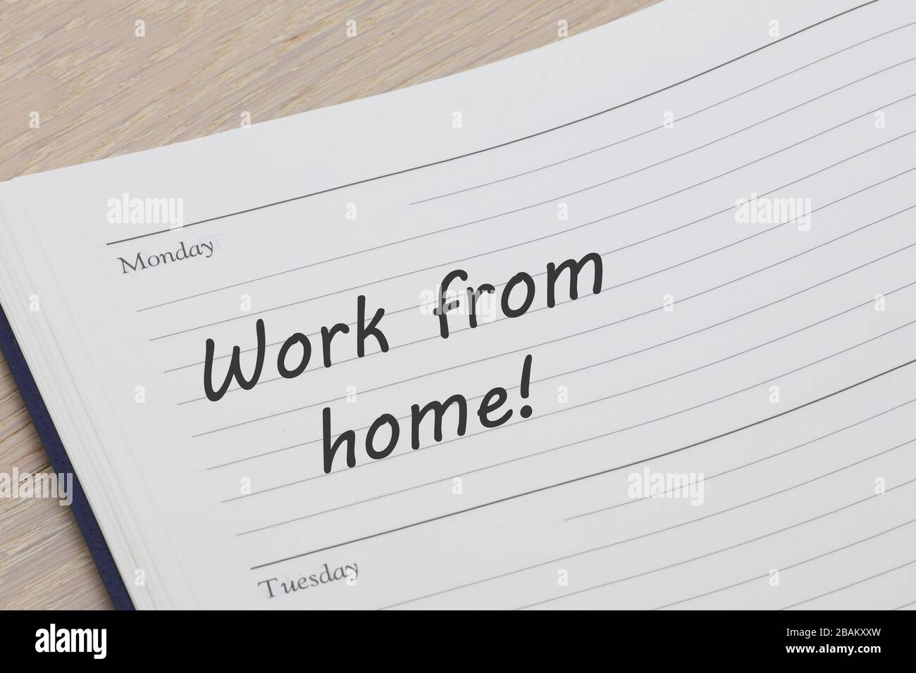 work from home job diary reminder open on desk Stock Photo - Alamy