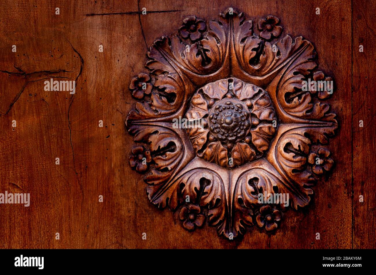 Detail embossed metal handle and an old door Stock Photo - Alamy