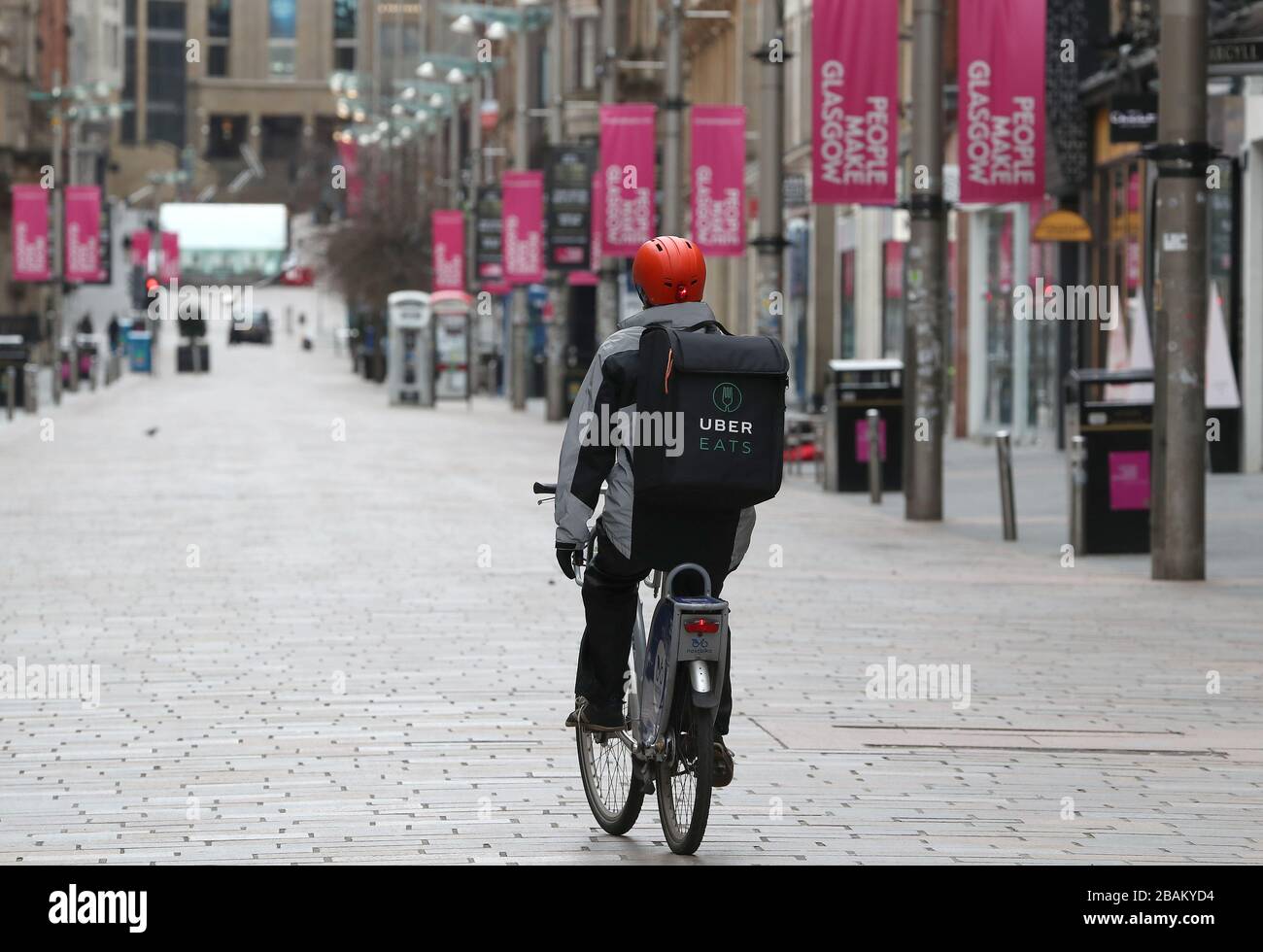 An UBER EATS cyclist in Glasgow as the UK continues in lockdown to help ...