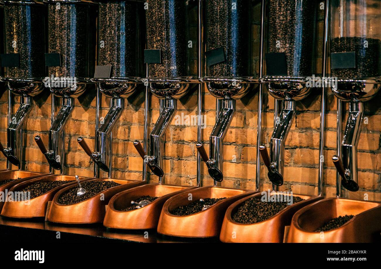 Different types of coffee in special dosing devices. Coffee for sale ...