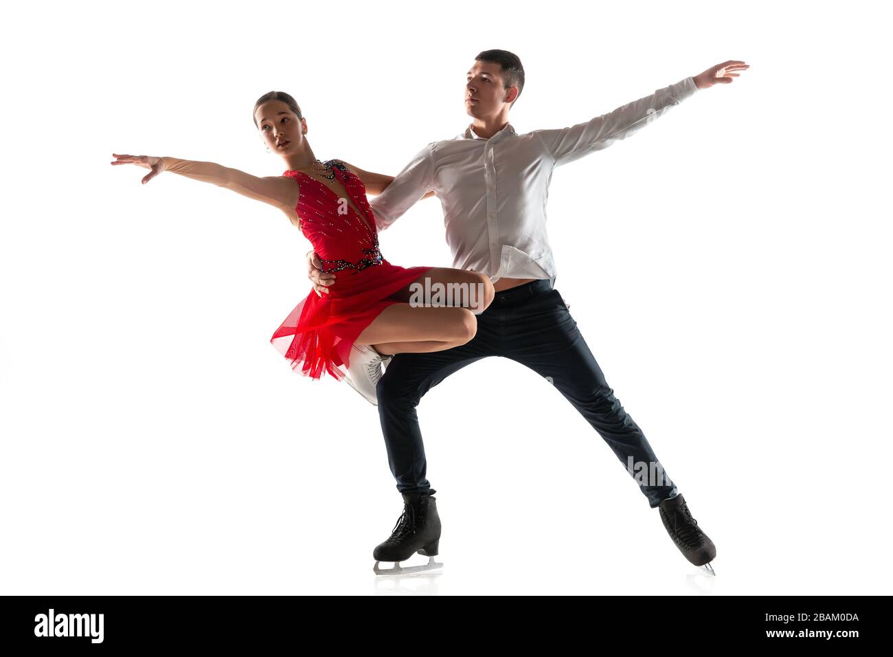 Duo figure skating isolated on white studio backgound with copyspace ...
